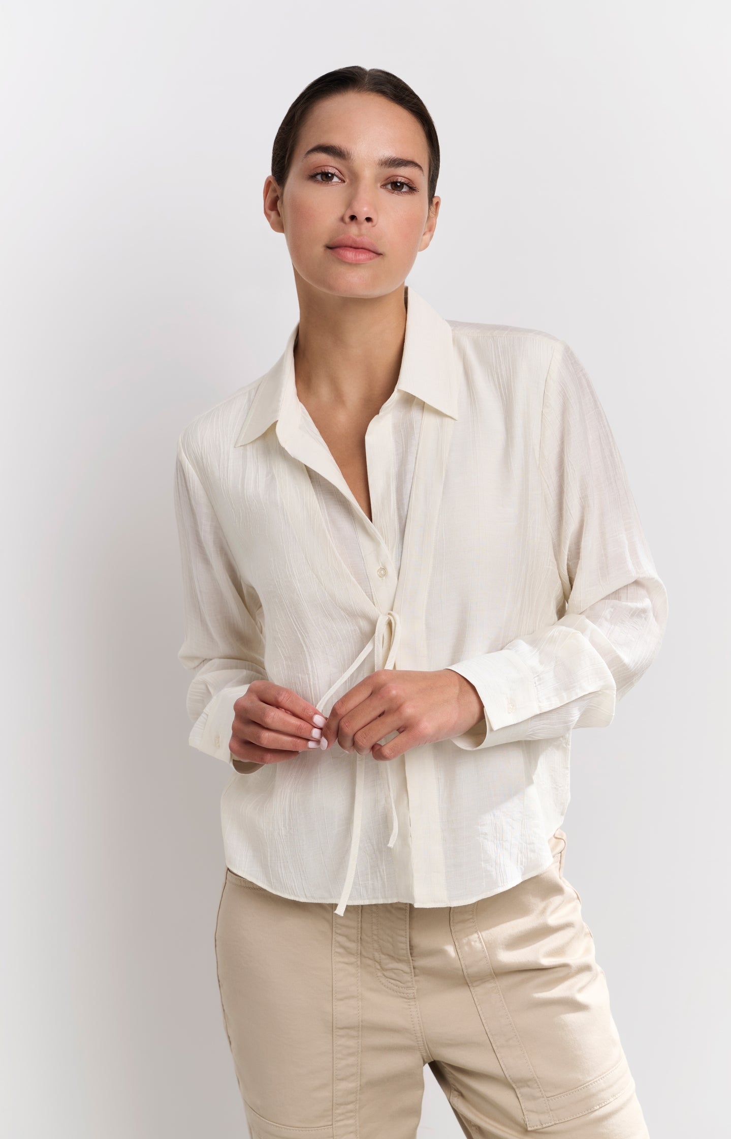 Layered texture blouse with tie detail