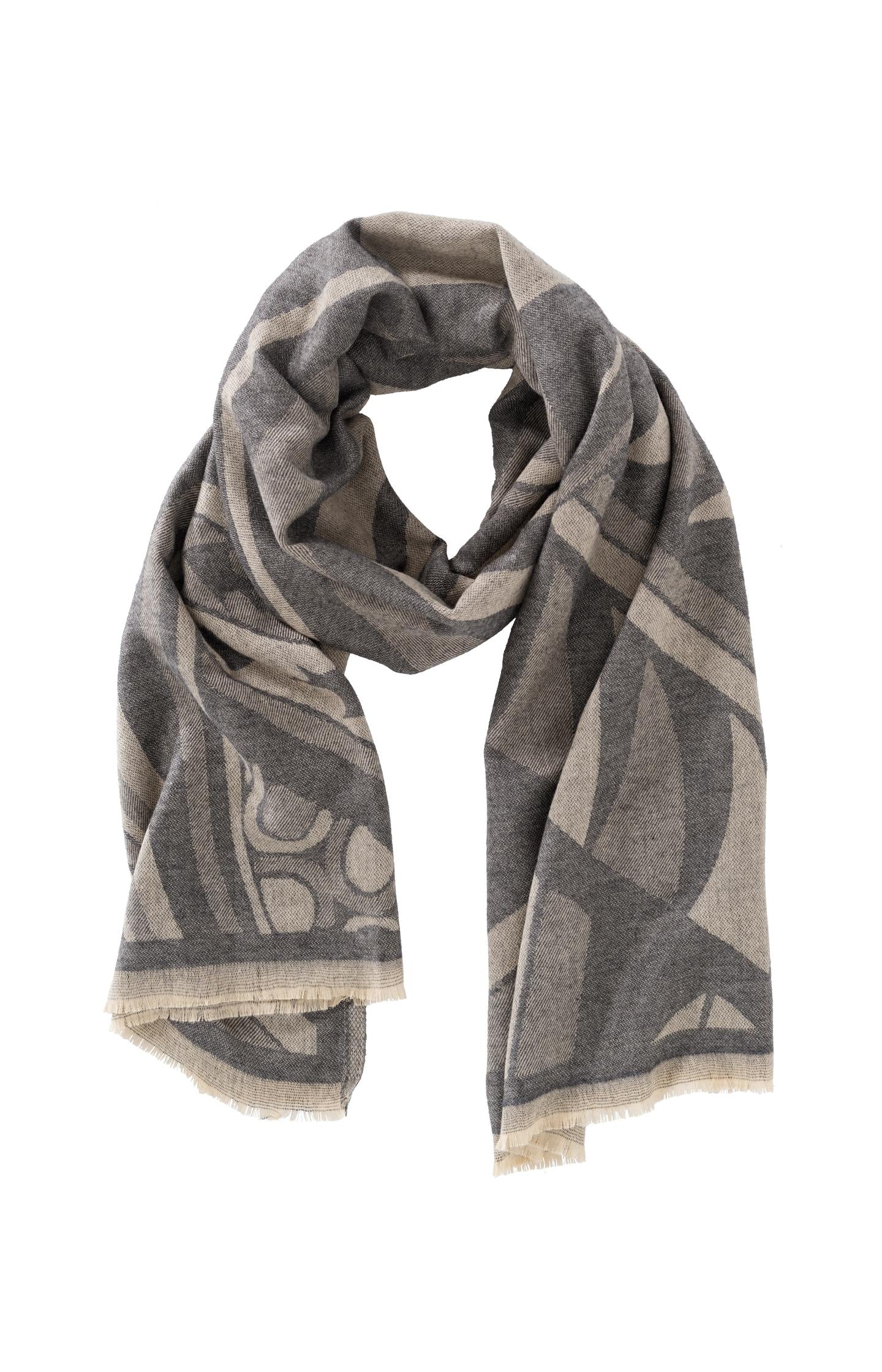 Scarf with a subtle abstract print and delicate fringes