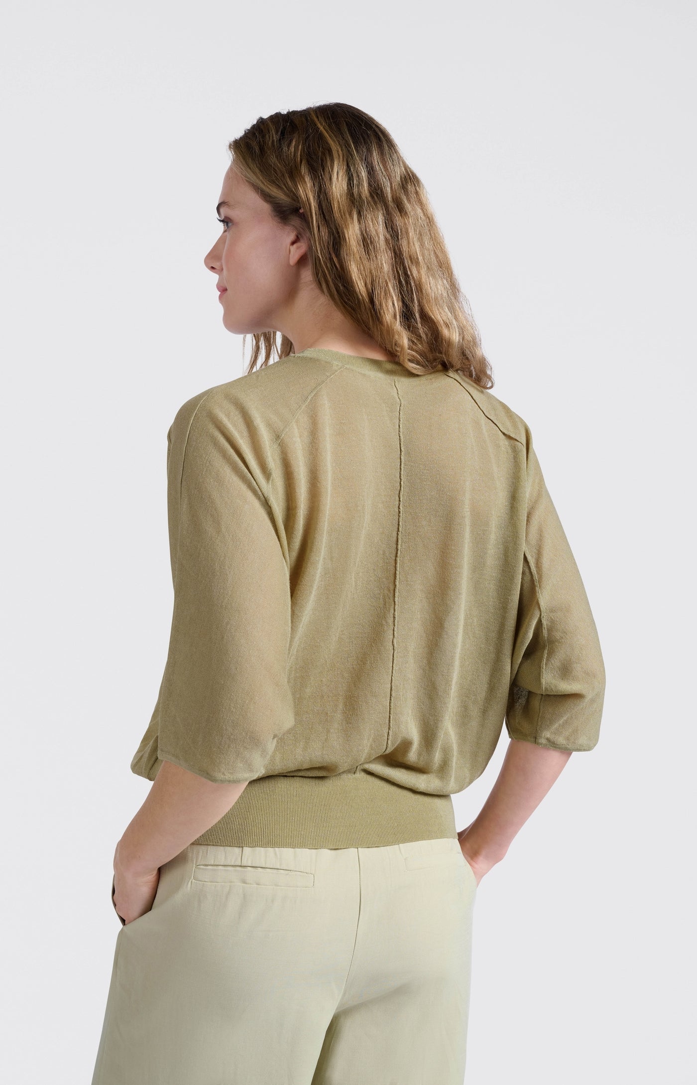 Transparent sweater with batwing sleeves