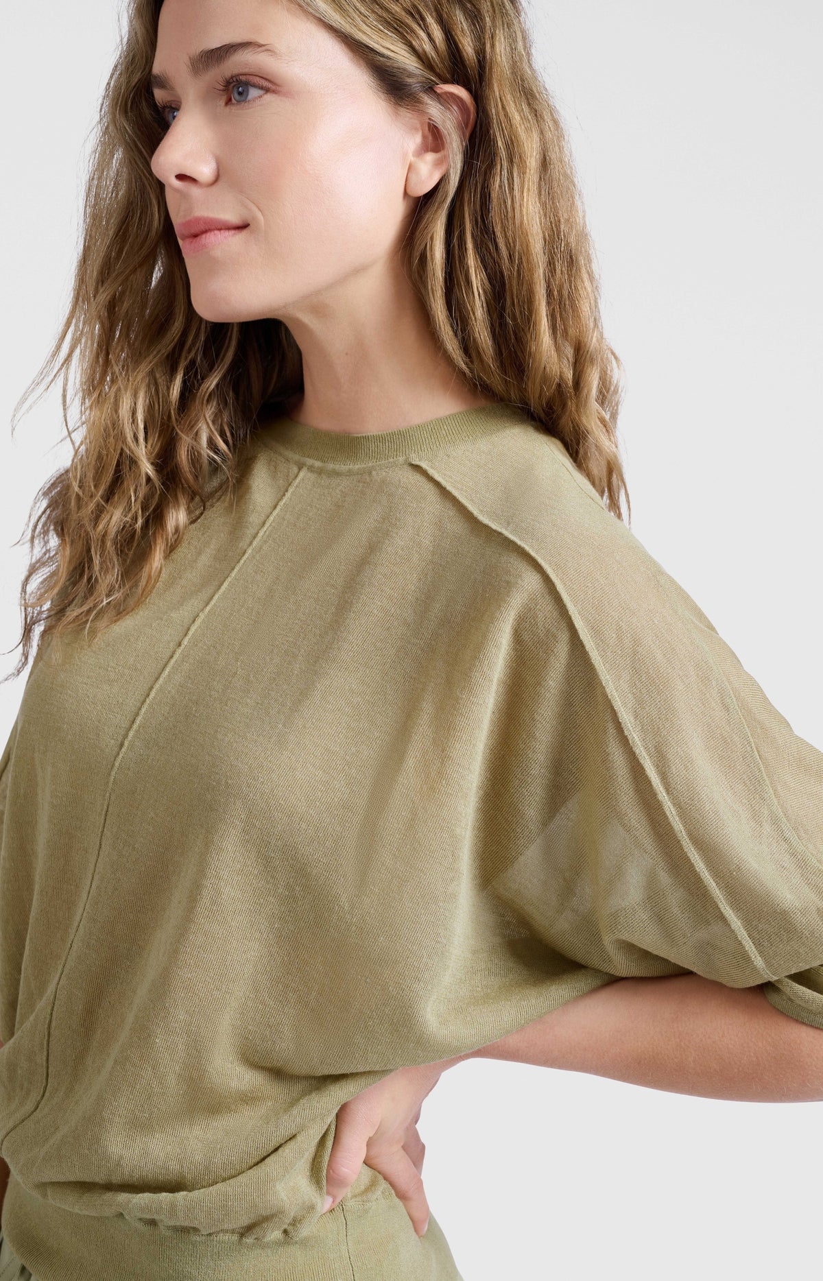 Transparent sweater with batwing sleeves