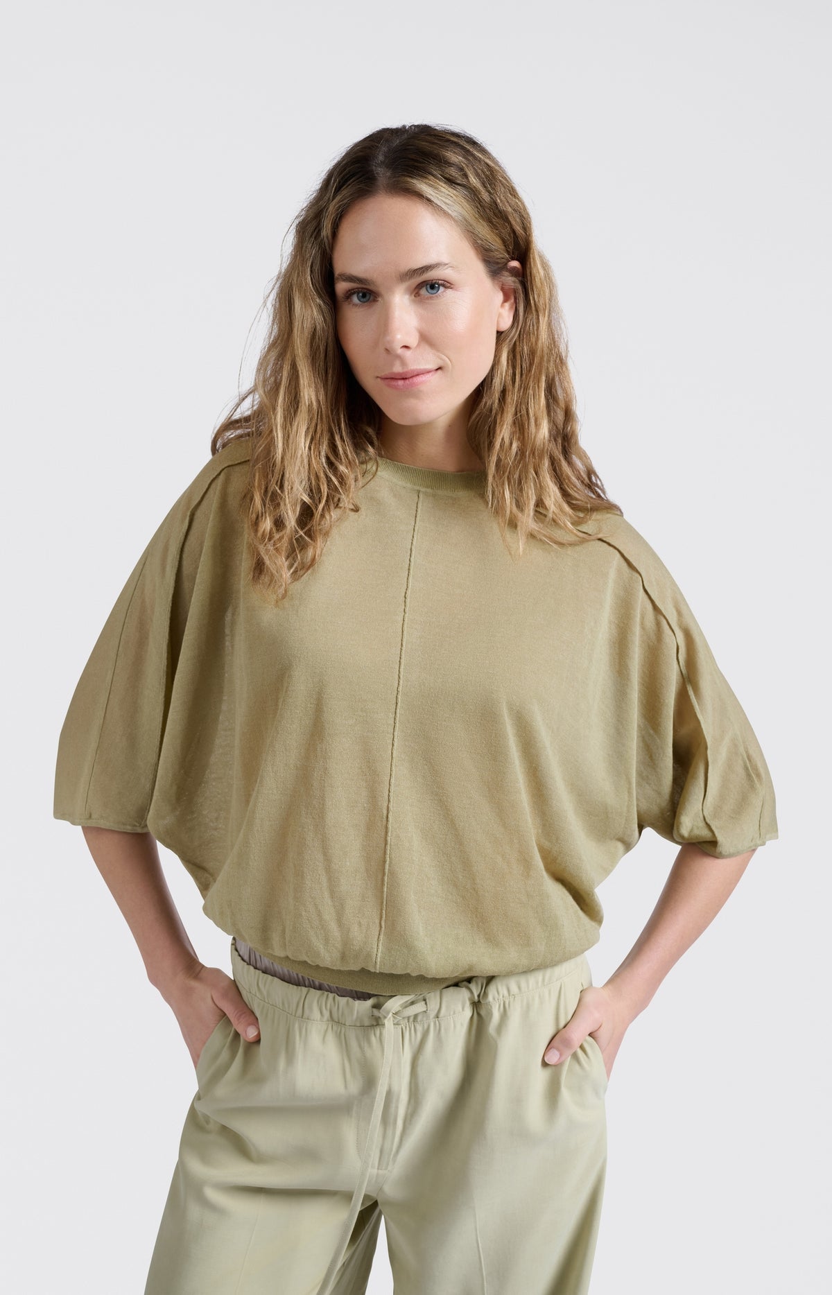 Transparent sweater with batwing sleeves